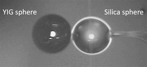 Physics Microsphere Pair Converts Microwaves To Light