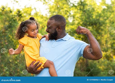 Father Laughing And Playing With His Daugher Stock Photo Image Of Portrait Outdoors