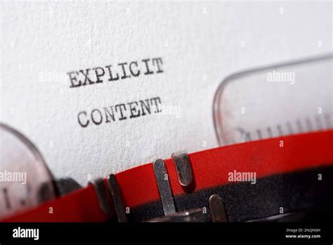 Explicit Content Text Written With A Typewriter Stock Photo Alamy