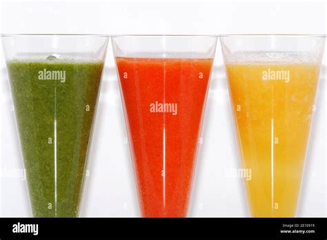 Three Different Colorful Refreshing Healthy Smoothie Drinks Partial