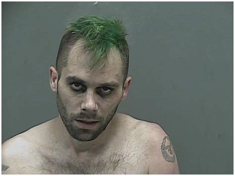 Naked Man Arrested After Beating On Police Cruiser Then Fleeing Into
