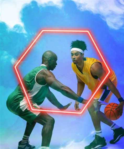 African American Basketball Male Players Dribbling Ball By Illuminated