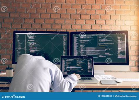 Man Programmers Are Sleeping While Working Analyzing On Desk In Code At