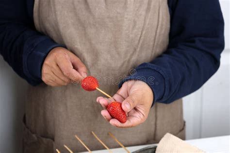 Female Hand Making Fruit Skewers With Fresh Strawberry Stock Image Image Of Nutrition Loss