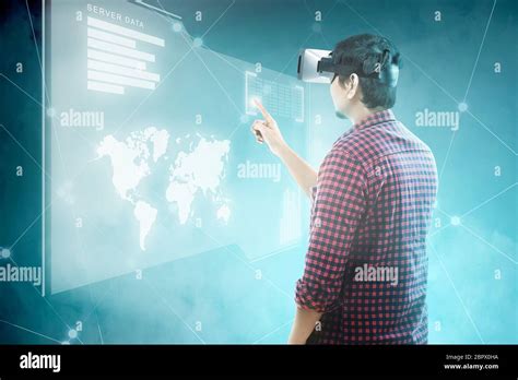 rear view of asian man touching binary code on digital interface with