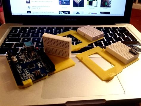 Arduino Friction Mounting Plate With Small Breadboard Addon By