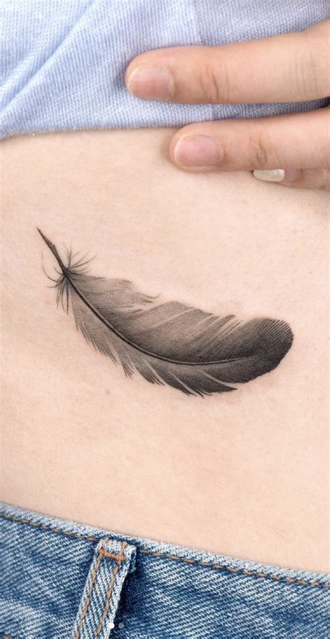 28 Amazing Feather Tattoo Ideas And Designs Tattoo Ideas And Designs