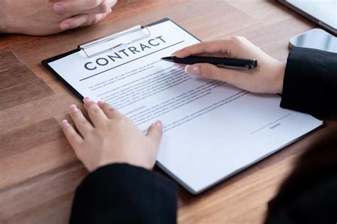 Premium Photo Businessman Review Agreement Document Before Signing