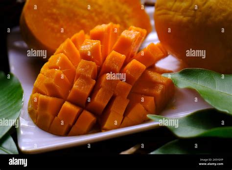 Mango Tropical Fruit With Green Leaf Ripe Mango In Grass Closeup Cut