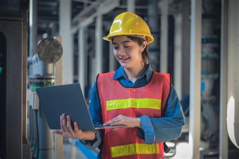 Premium Photo Asian Woman Engineer Using Computer Working In Factory