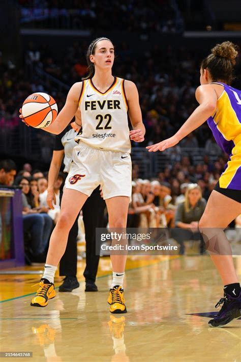Indiana Fever Guard Caitlin Clark Dribbles Up The Court During The