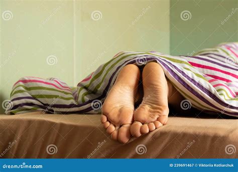 Bare Feet On The Bed The Girl Sleeps On The Bed Stock Image Image Of