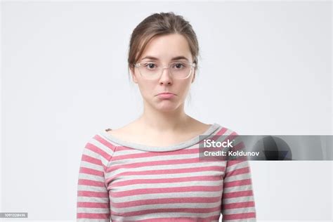 Young Beautiful Sad Woman Serious And Concerned Looking Worried And