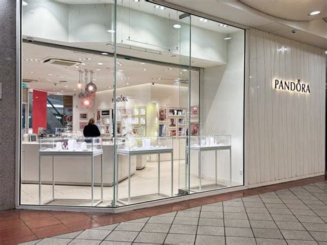 Elegant Pandora Jewelry Store With Glass Display Cases Inside A Modern