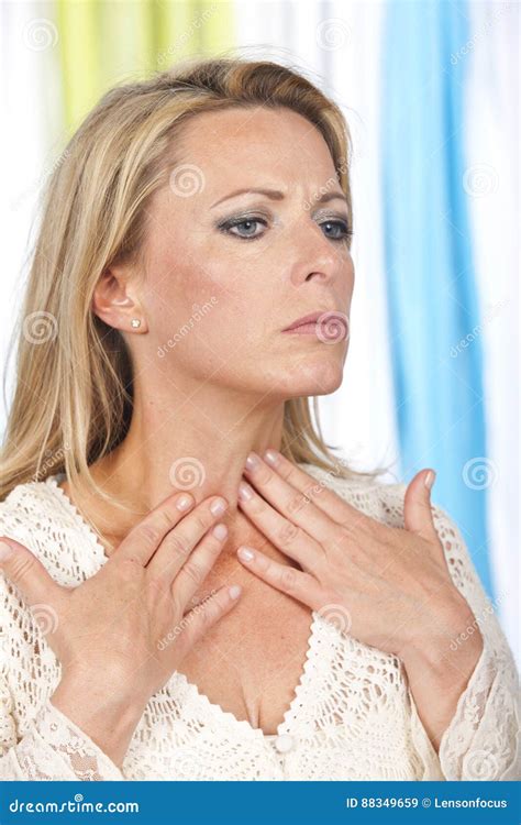Mature Woman With Hands At Her Throat Stock Image Image Of Mature