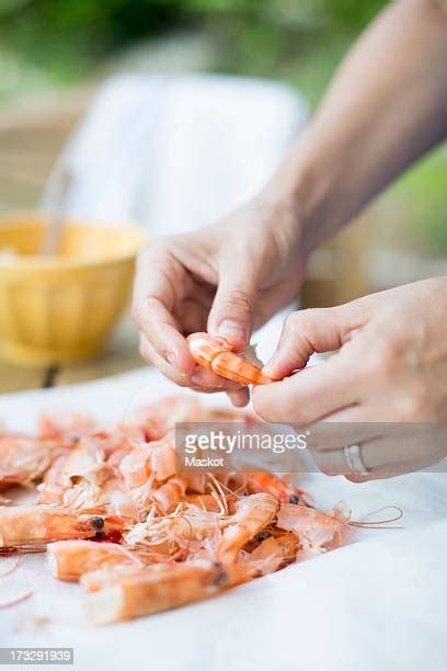 Peeling Shrimp Photos And Premium High Res Pictures Getty Images