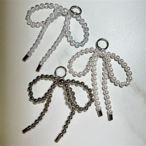 🚀당일발송🚀21진주오로라리본키링 진주키링 리본키링 열쇠고리 가방고리 리본고리 진주고리 키링 악세사리 휴대폰스트랩 휴대폰고리 우정키링 커플키링 에이블리