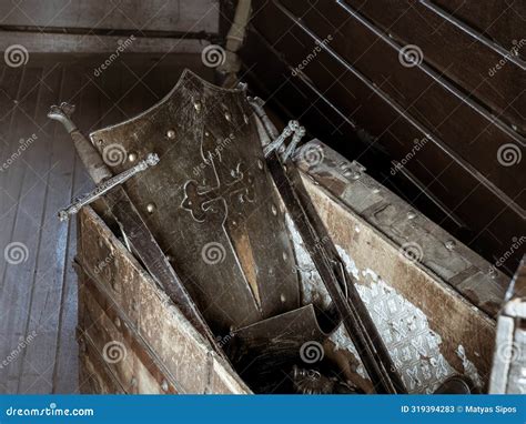 Medieval Christian Crusader Weapons Swords And Shield In A Rustic Wooden Chest Stock Image