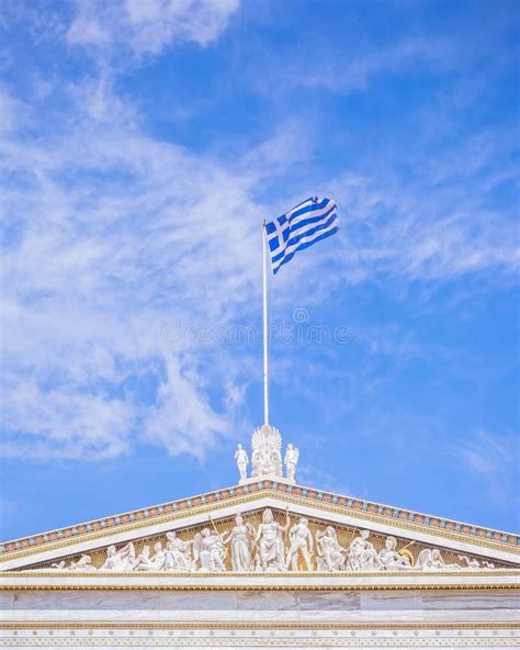 Greek Flag On The Classical Pediment Of Athens Academy Building Under