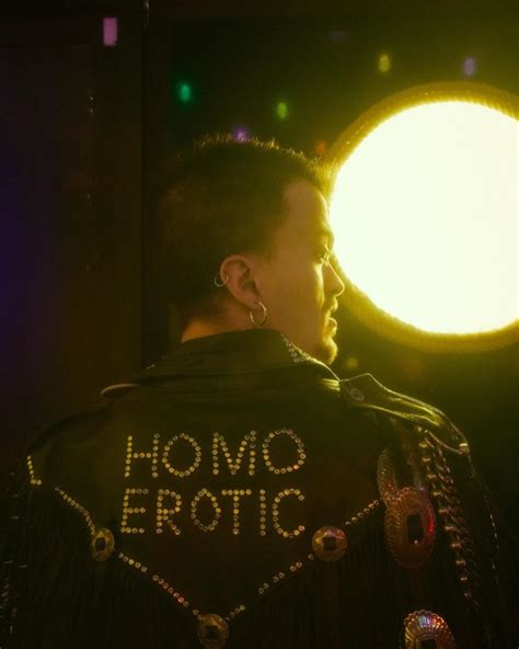 Embracing His True Self The Dwarf In Black Leather Radiates Confidence