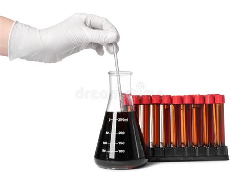 Scientist Mixing Brown Liquid In Conical Flask On White Background Closeup Stock Image Image