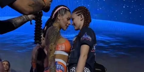 Mma Fighters Surprise Crowd By Kissing At Face Off And Flashing Their
