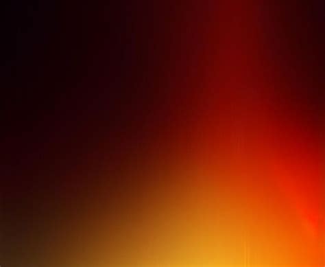 Gilded Shadows Dark Grainy Color Gradient Background