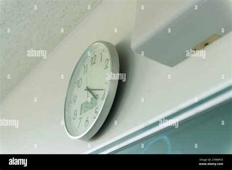Clock In Classroom Stock Photo Alamy