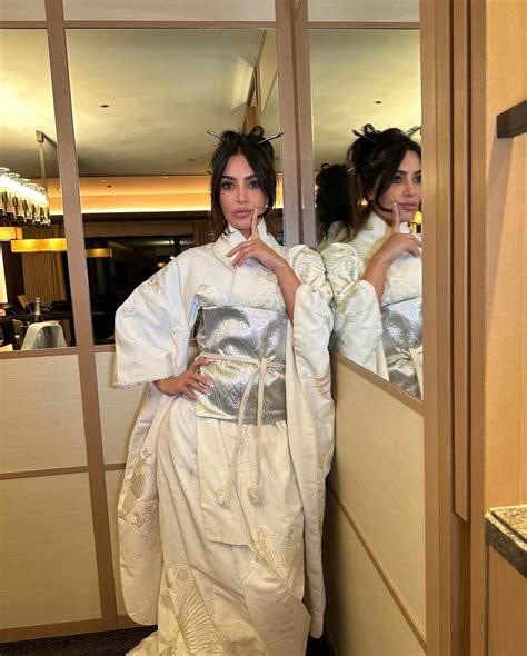 Kim Kardashian Poses In Kimono In Photos By North West Us Weekly