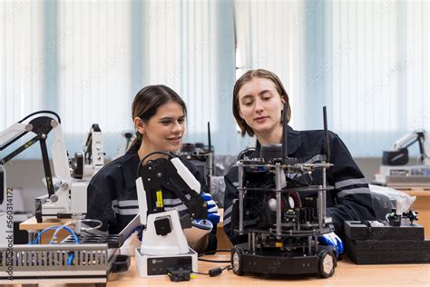 two female engineers worker discuss and training or maintenance ai