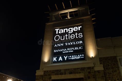 Sign For Tanger Outlets An Outdoor Discount Shopping Mall At Night