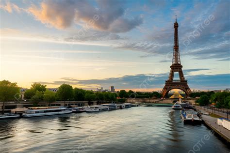 Eiffel Tower And Seine River Reflections In Paris At Dusk Photo And