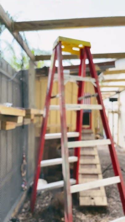 Hardware Cloth Being Installed On The Top Of The Run Making Sure Our