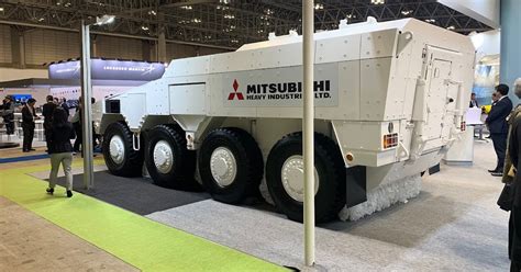 The Dead District Mitsubishi Heavy Industries ის ჯავშანტექნიკის პავილიონი გამოფენა Dsei ზე