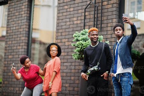 Four African Friends Having Fun Outdoors Two Black Girls With Guys