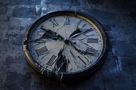 Broken Clock Face With Shattered Glass On A Textured Dark Wall In An