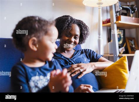 Mother laptop daughter hi-res stock photography and images - Alamy
