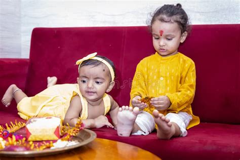 Brother And Sister Cute Expression On The Occasion Of Hindu Raksha Bandhan Festival At Indoor