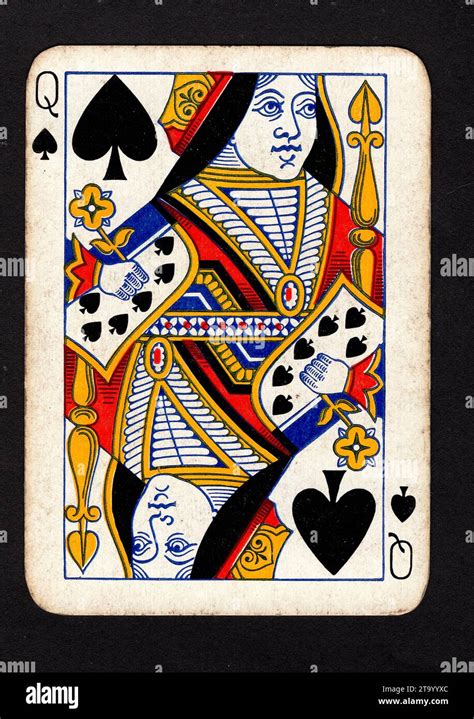 A Vintage Queen Of Spades Playing Card Isolated On A Black Background