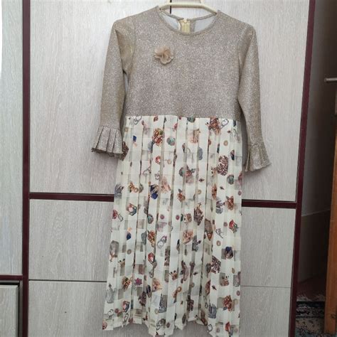 کمدا قیمت و خرید لباس مجلسی کودک رنگ طلایی سایز 70