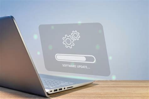 premium photo a laptop on the table with updating progress bar on