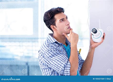 The Man Installing Surveillance Cctv Cameras At Home Stock Image Image Of Perplexed Baffled