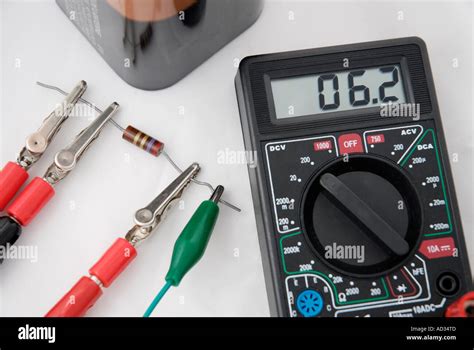 Digital Multimeter Connected To Circuit Including Battery And Resistor Stock Photo Alamy
