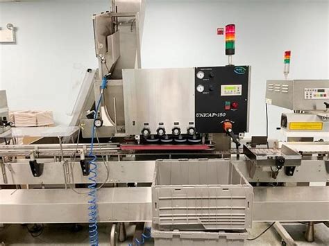 used cvc automatic bottle capsule filling system 4828403 for sale in
