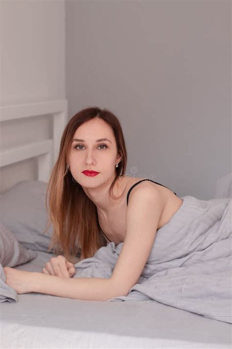 Pretty Redhead Woman In Black Lace Lingerie On Bed With Grey Sheets Stock Image Image Of Model