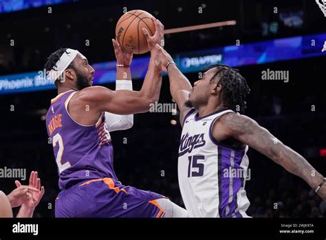 Phoenix Suns' Josh Okogie (2) during the second half of an NBA basketball game against the ...