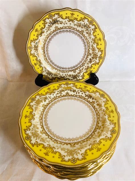 Set Of Eleven Yellow Spode Copeland Jeweled Dinner Plates With Raised