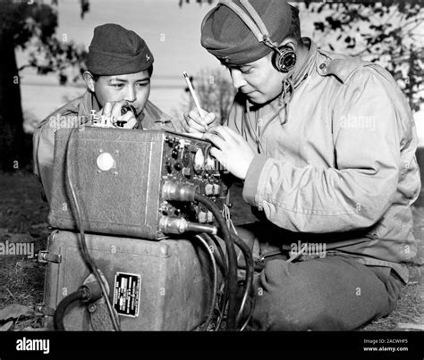 Navajo Code Talkers Navajo Indian Marines Using A Field Radio In The