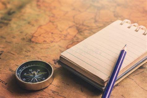 Notepad For Note With Pencil Compass On Paper Map For Travel Adventure