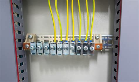 Grounding Terminal Block With Connected Yellow Wires Inside An